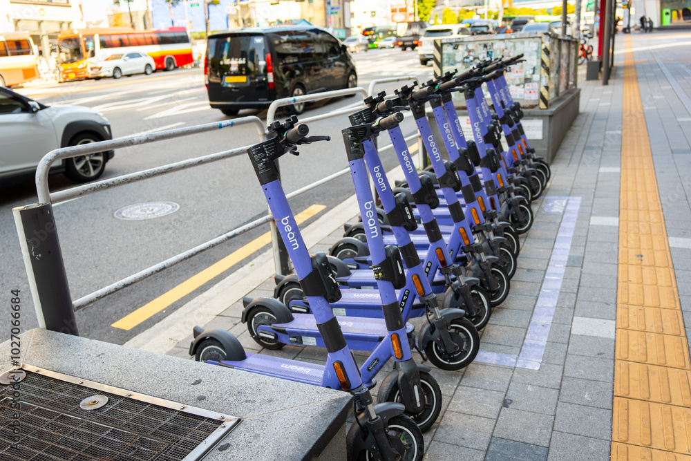 SEOUL, SOUTH KOREA - SEPTEMBER 28, 2024: Beam e-scooters for rent ...