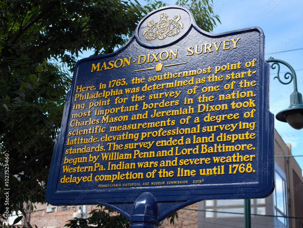 An historical marker for the Mason–Dixon line.It is is a demarcation line separating four ...