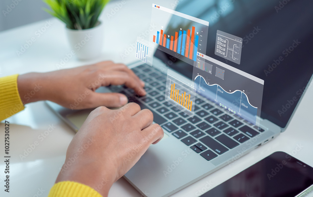 Business woman use computers to analyze business and manage corporate ...