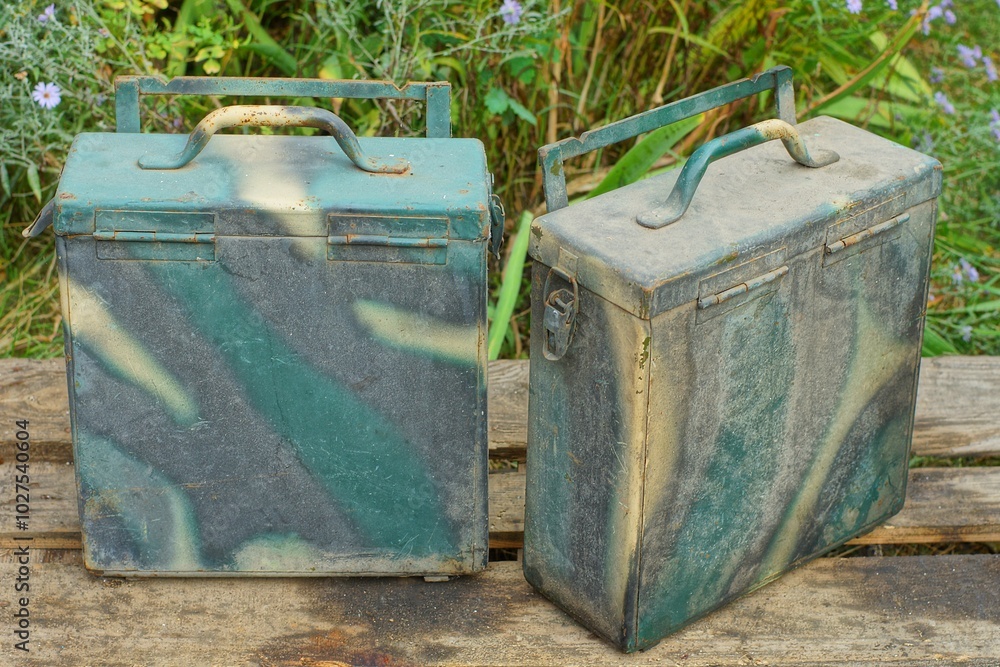 two iron old painted retro army military khaki square closed with ...