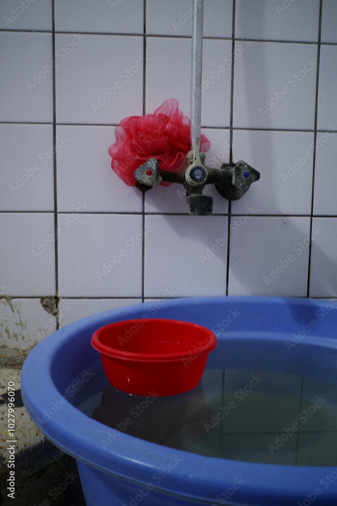 Basra, Iraq - October 11, 2024: Bathroom Sink with Basin, Red Bowl, and ...