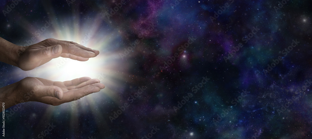 Male Reiki Master sending cosmic healing energy - male parallel hands ...