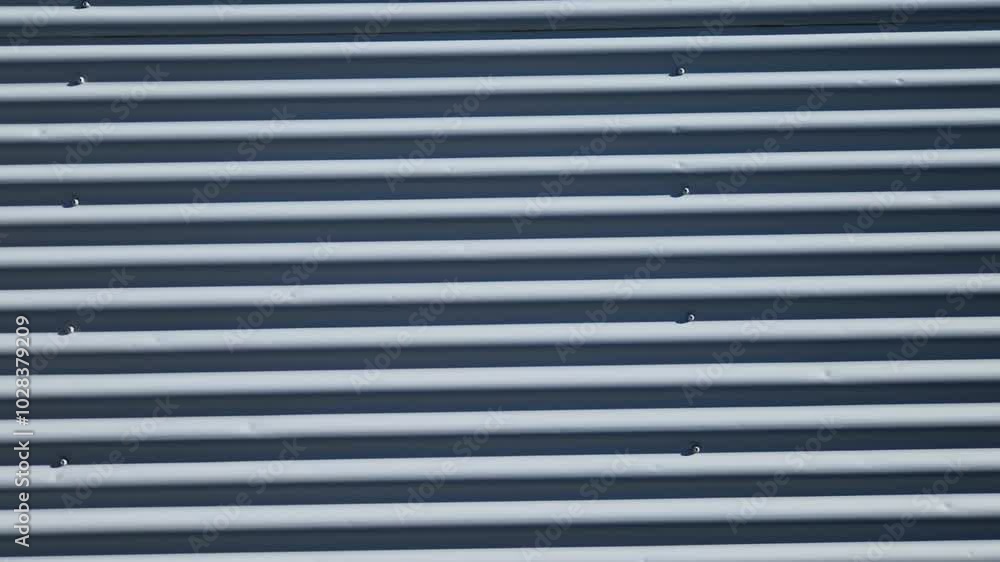 building is lined with square panels. metal sheet wall cladding with ...