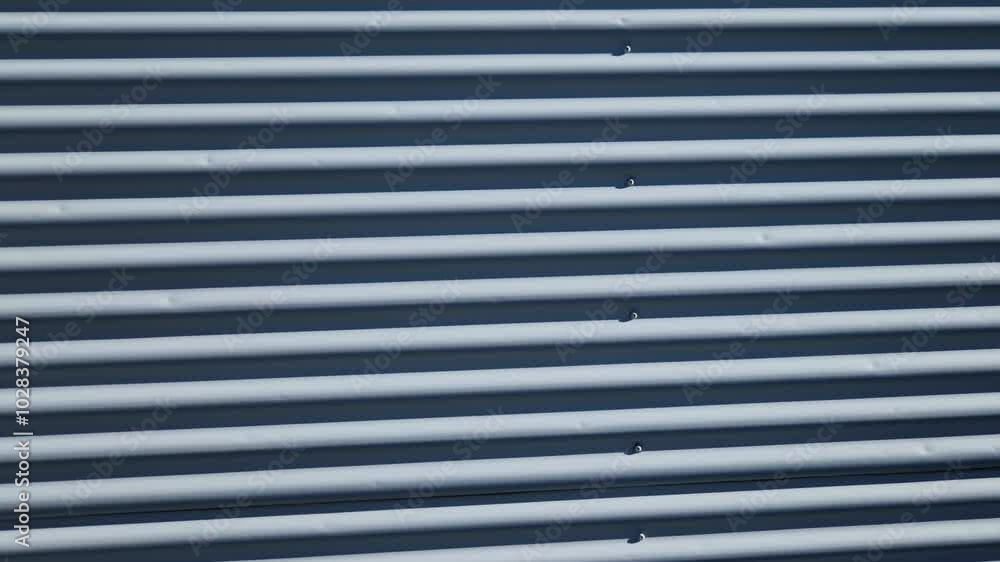 building is lined with square panels. metal sheet wall cladding with ...