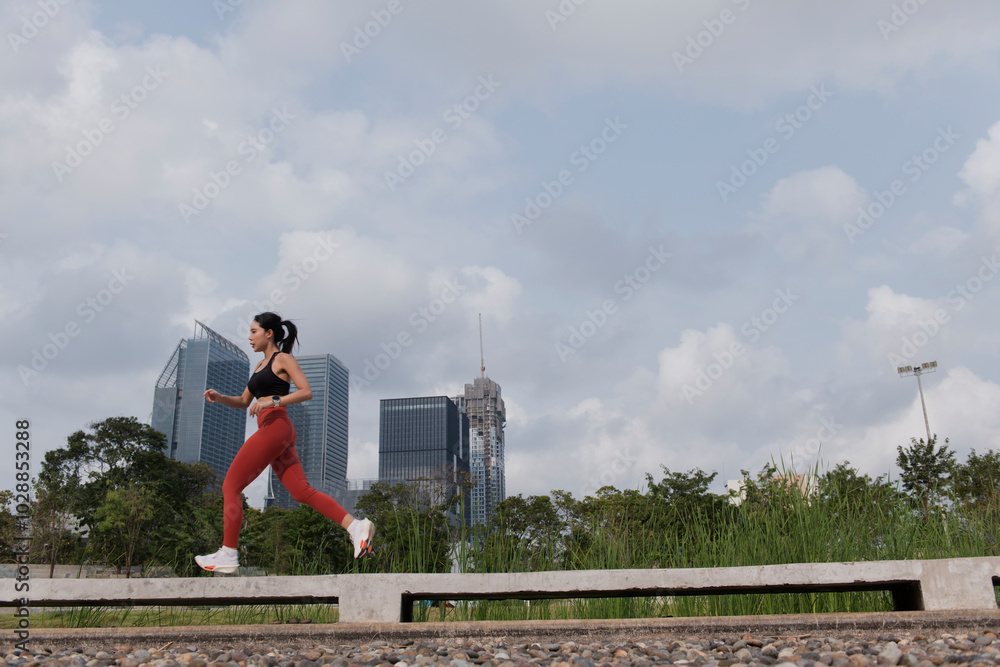 person running on the street. photo of sporty woman running exercise ...