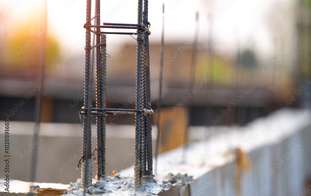 Concrete footings and reinforcing steel rods at a construction site ...
