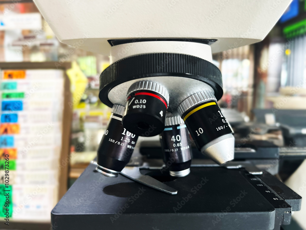 microscope, microscope's objective lenses, clearly displaying the ...