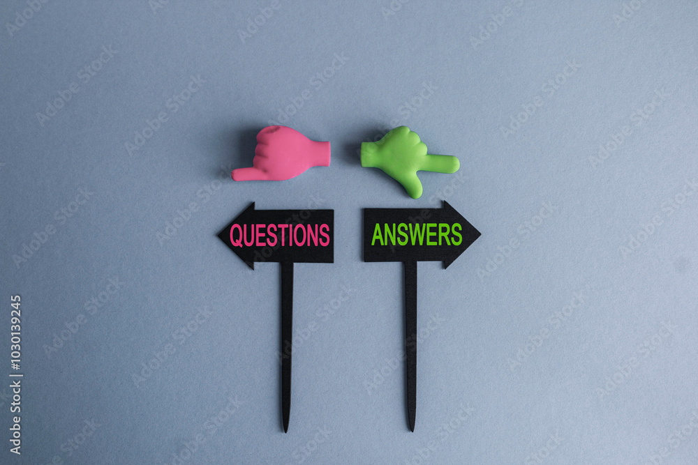 Questions and Answers symbol. BLACK ARROW-SHAPED PLAQUES WITH THE WORDS ...