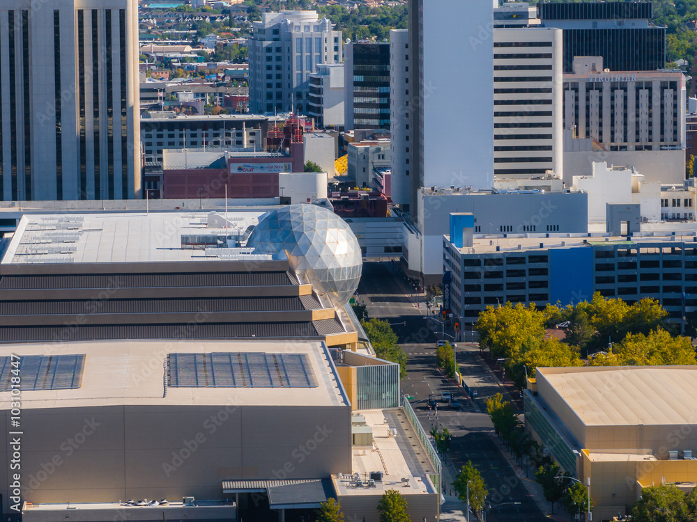 The image captures an aerial view of downtown Reno, Nevada, showcasing ...