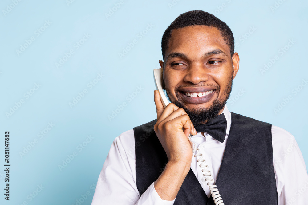 Hospitality industry staff gives lodging information to people on ...