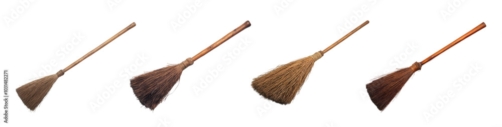 Four traditional brooms with wooden handles in varying colors and ...