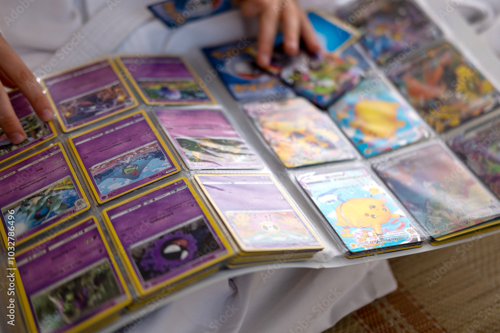 boy in white judo uniforms, child enjoy Pokémon card game, Energy and ...