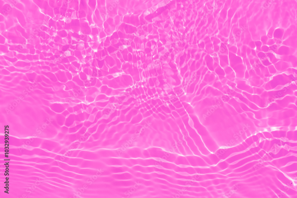 Pink water bubbles on the surface ripples. Defocus blurred transparent ...