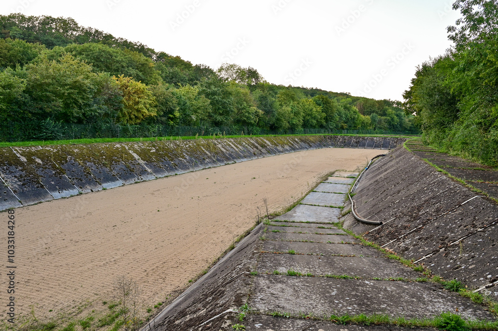 Empty rainwater retention basin, infiltration trench or drinking water ...