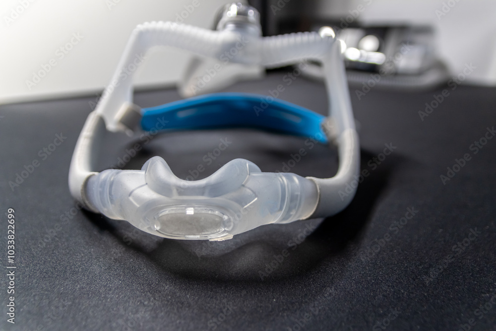 CPAP mask with nose mask or nose mask headgear cpap machine against ...