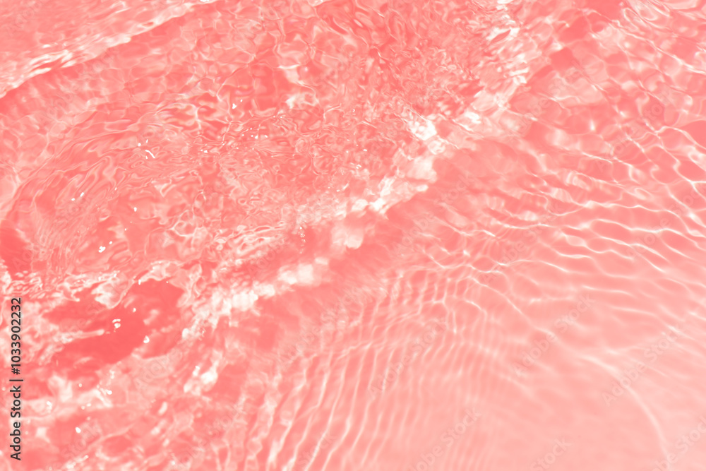 Pink water bubbles on the surface ripples. Defocus blurred transparent ...
