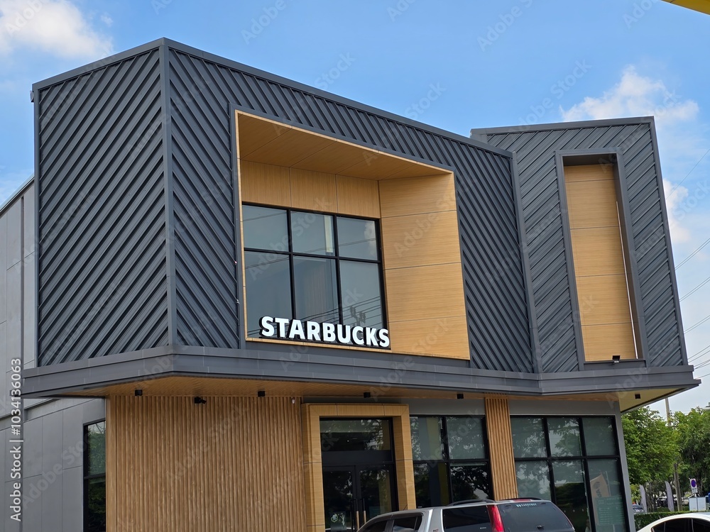 Modern Starbucks exterior with unique architectural design and ...