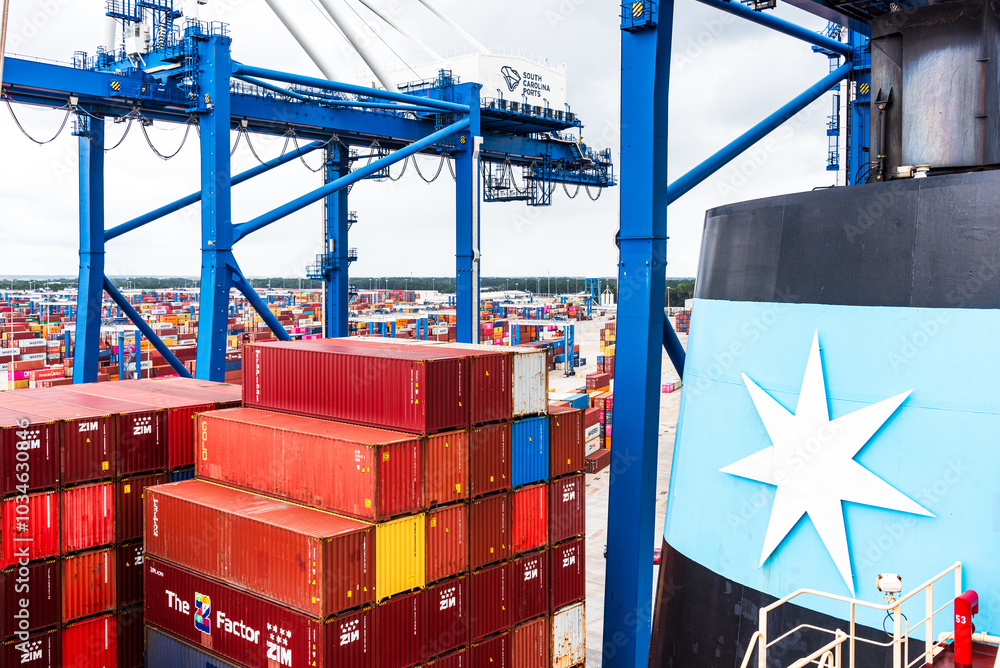Maersk Line logo on the funnel of the container ship, she is berthed in ...