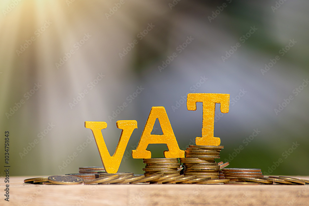 Vat Concept.Word vat with stacked coins there is a notebook calculator on the desk.VAT Stock ...