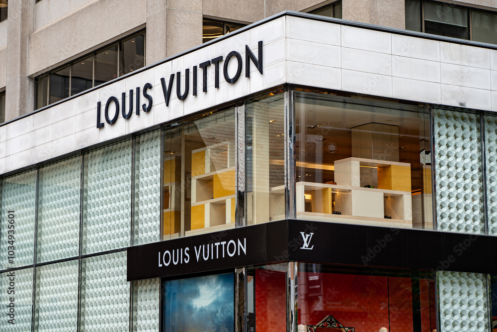 Louis Vuitton logo store sign. Louis Vuitton is a French luxury fashion ...