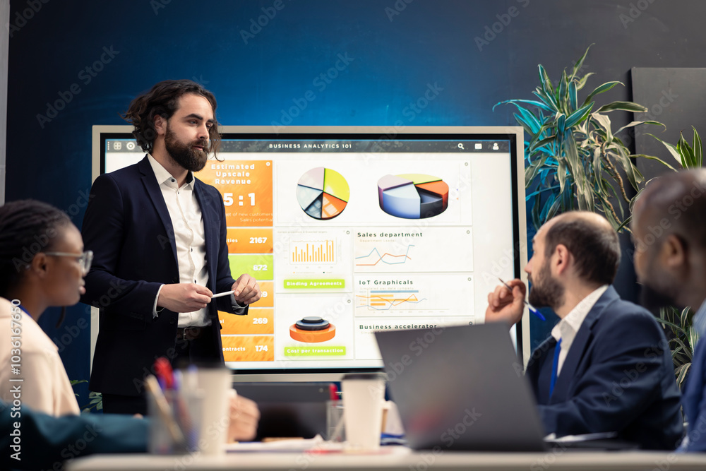 Financial expert briefing his staff members about new corporate ...