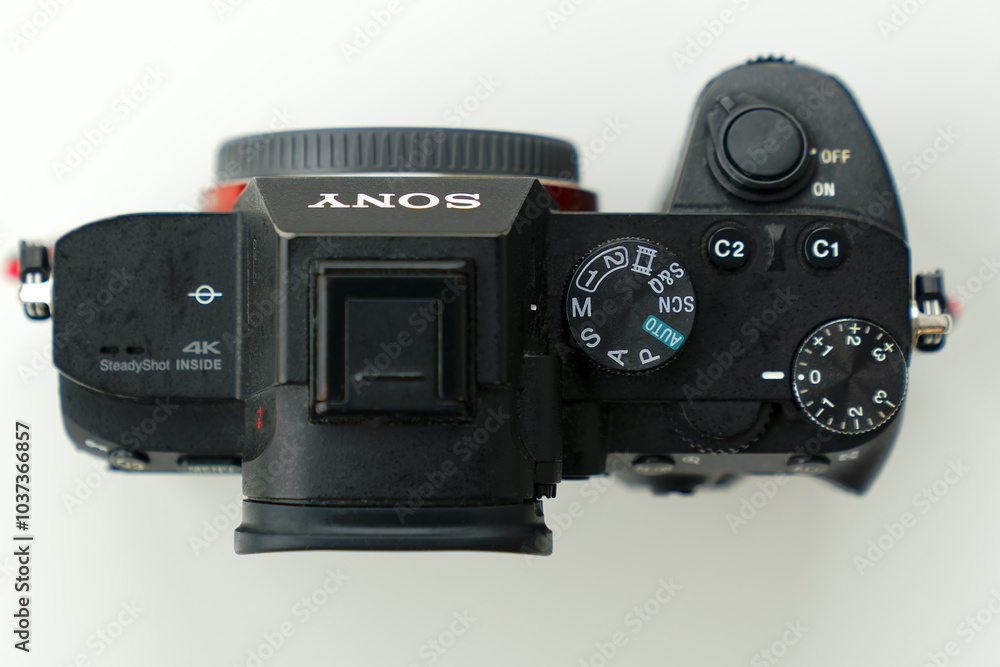 Close-up top view of used black body of Sony photo camera model Alpha 7 ...