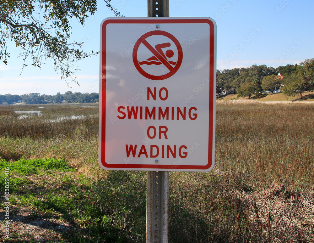 Warning Sign Prohibits Swimming and Wading Near the Scenic Lake Area ...