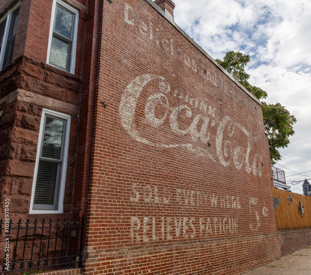 Washington DC - September 19 2024: Old Coca Cola mural on a red brick ...