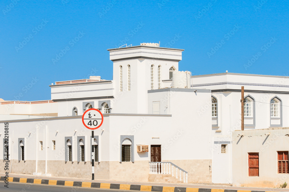 Exploring the traditional architecture of Sur Oman with historic white ...
