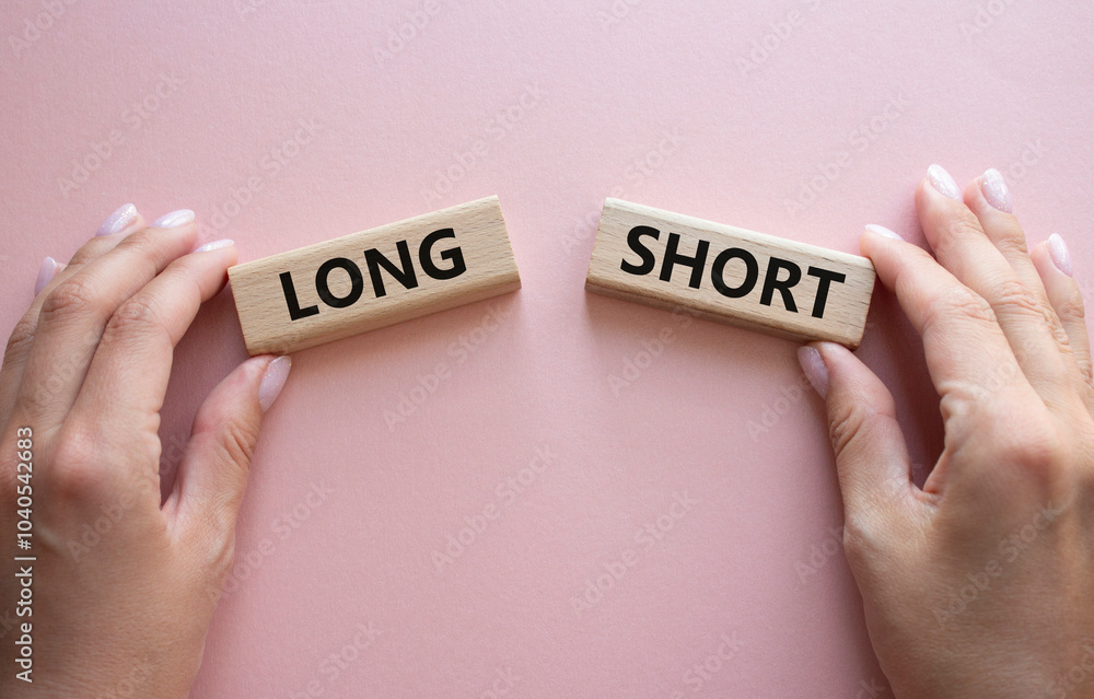 Short vs Long symbol. Concept word Short vs Long on wooden blocks ...