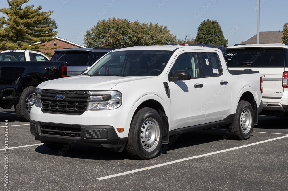 Ford Maverick XL Hybrid display at a dealership. Ford offers the ...