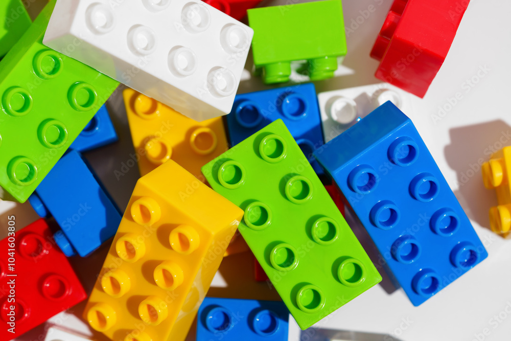 Close-up background of scattered colored plastic blocks or bricks toy ...
