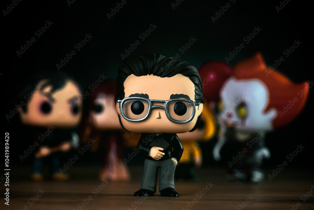 Funko POP vinyl figure of Stephen King in front of Funko POP vinyl ...