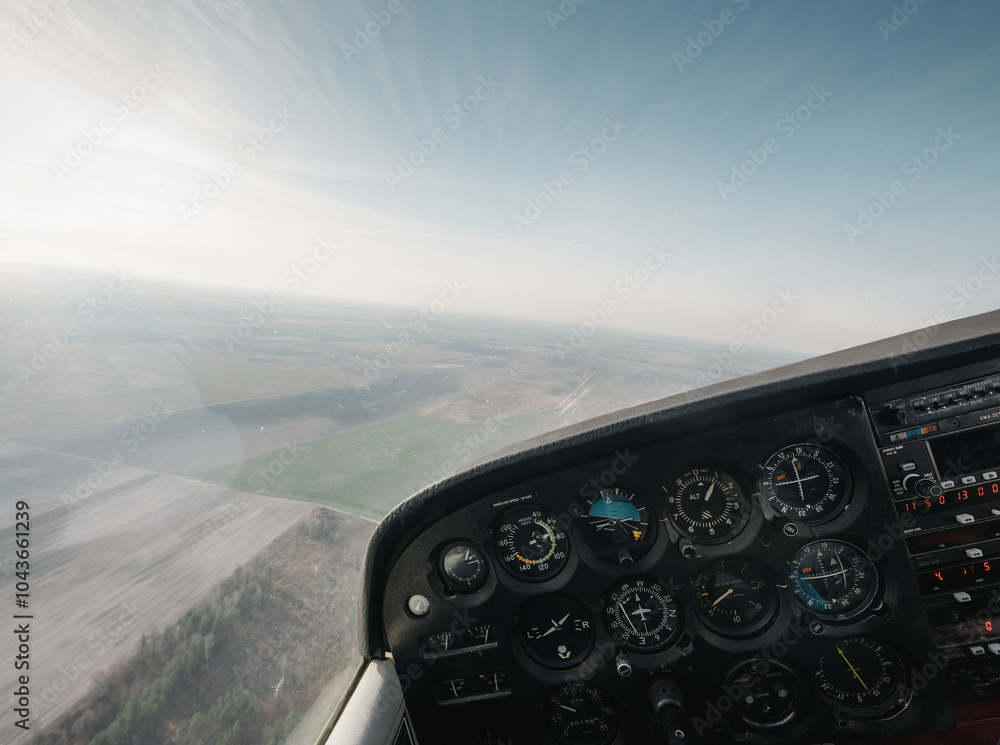 Point of view: piloting small aircraft. Cockpit of light utility ...