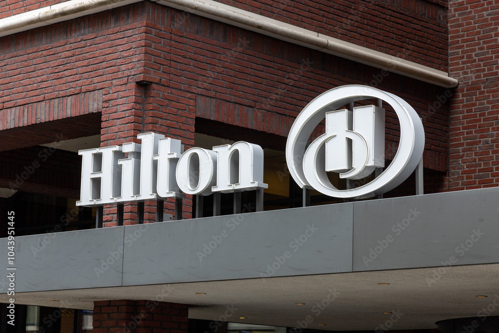 Hilton Hotel logo sign. Hilton is an international hotel and resort ...
