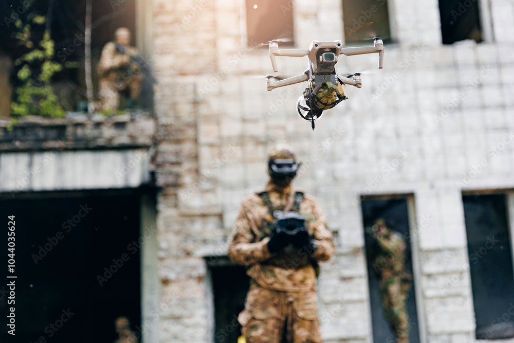 Soldier UAV operator launches army drone with bomb to drop into enemy ...