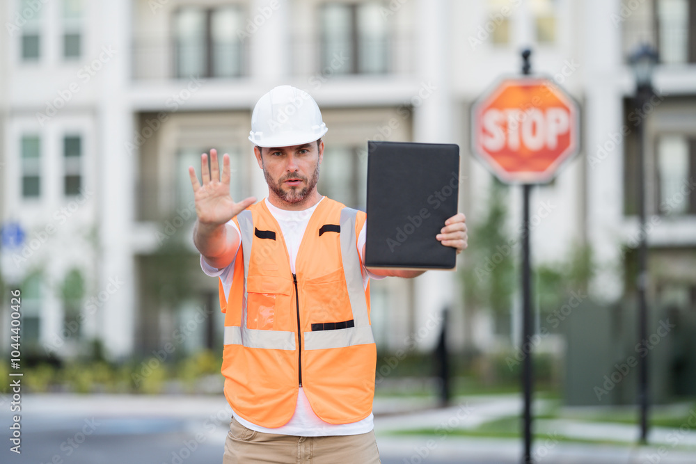 Construction worker with stop sign. stop sign or paddle used for ...