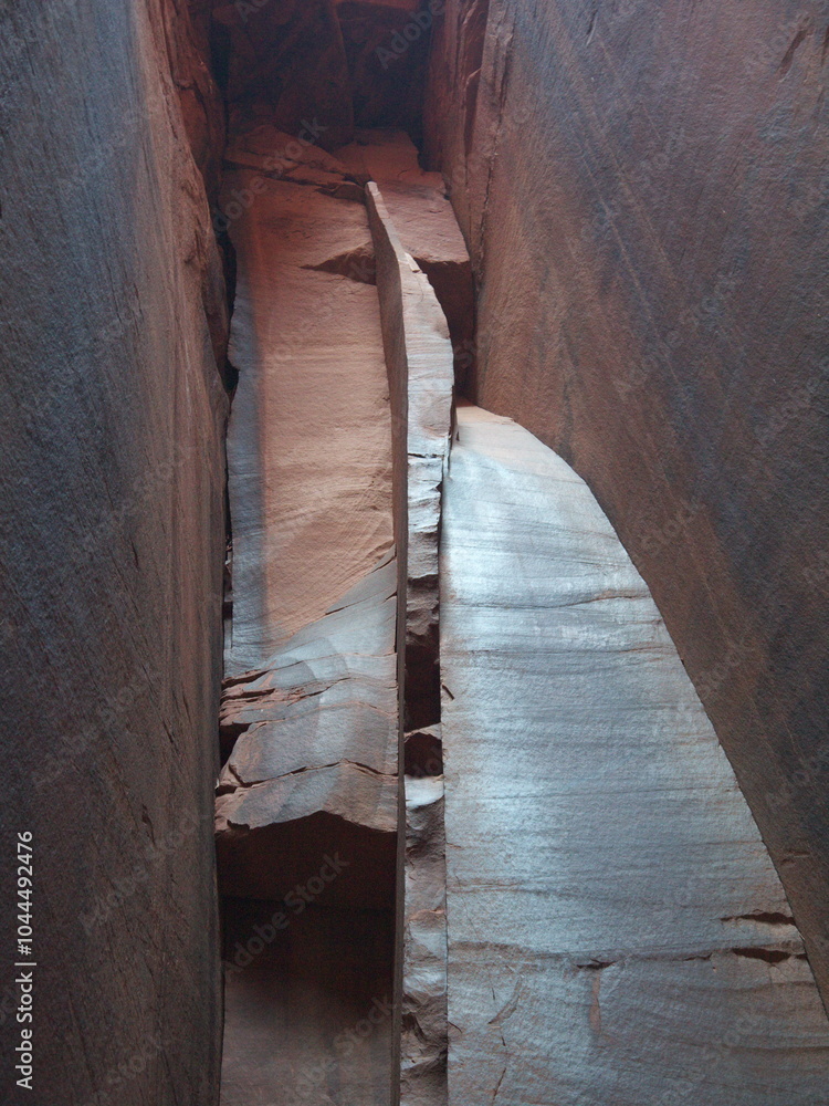 Giant crack in the rock face with massive solid stone blocks in ...