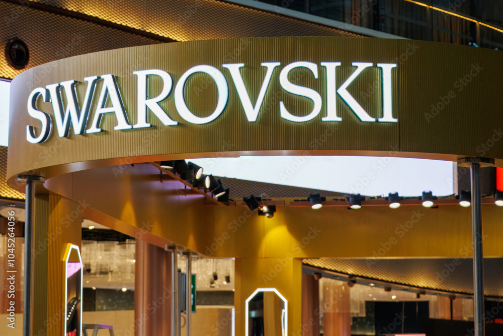Swarovski luxury brand retail shop logo signboard on the storefront ...