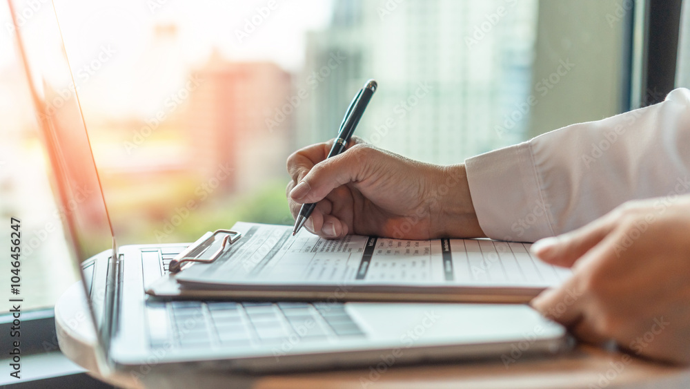Administrator's hand fill in business schedule form document writing on ...