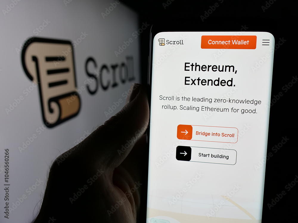 Stuttgart, Germany - 10-21-2024: Person holding cellphone with webpage of blockchain company ...