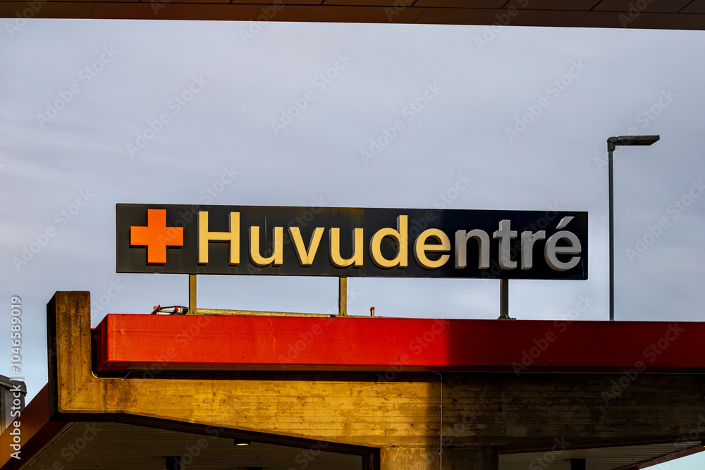 Stockholm, Sweden The main entrance and sign in Swedish to the Huddinge ...
