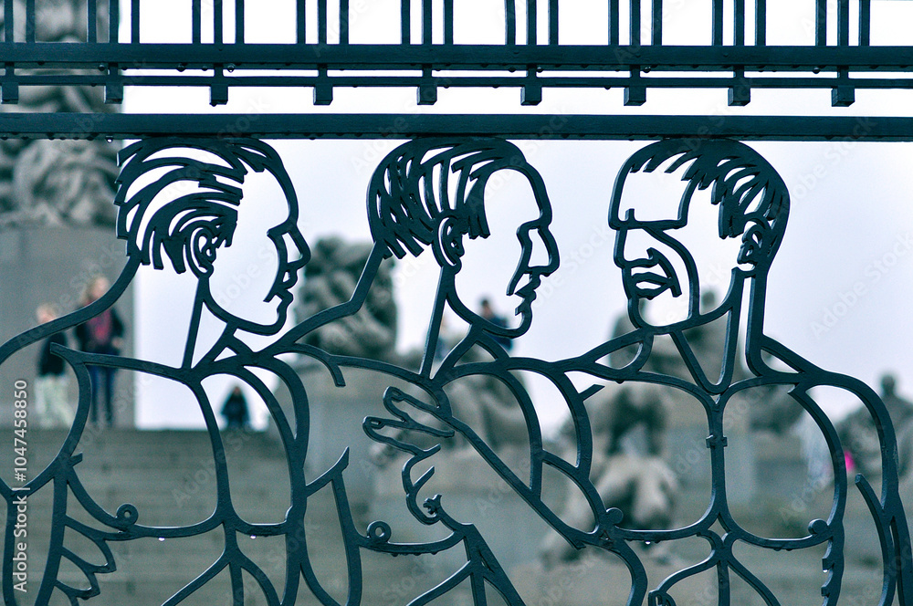 OSLO - JAN 05: Close-up of iron fence with men faces as main entrance ...