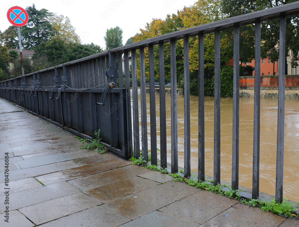 movable floodgate installed in the bridge railing to prevent river ...