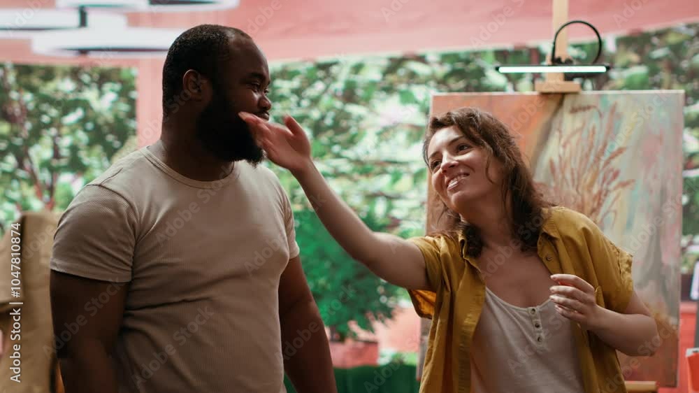 Painters use a hologram to create masterpiece with watercolor paint ...