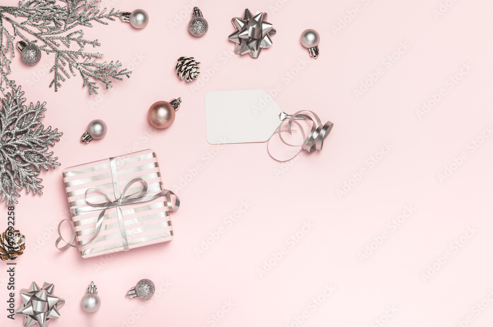Christmas card, background. Pink gift box with silver ribbons and ...