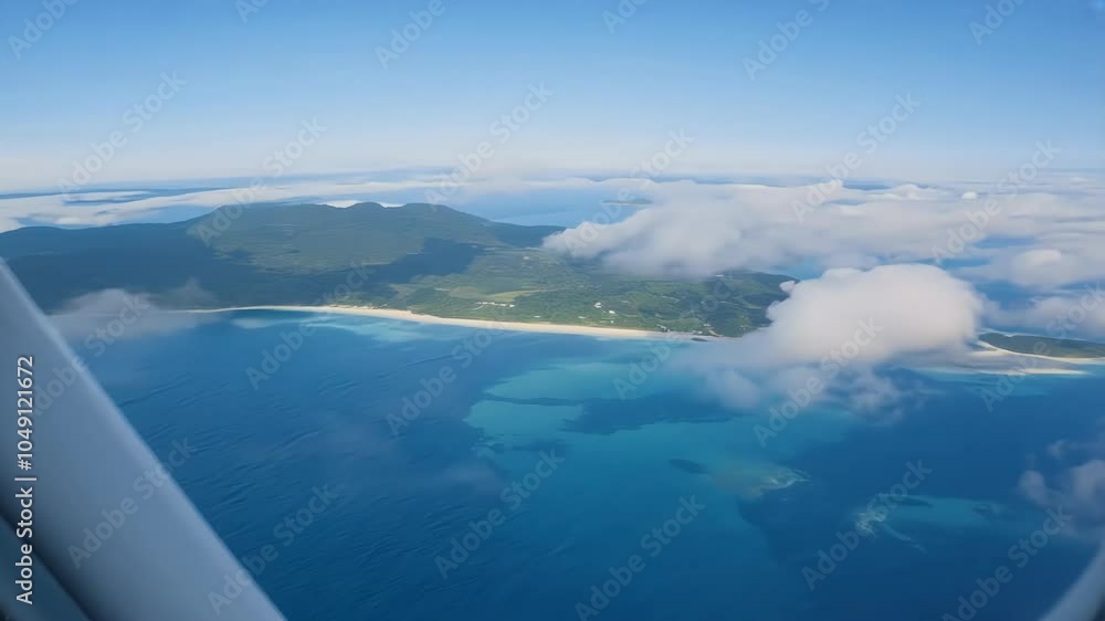 bird'seye view airplane window revealing fluffy white clouds shimmering ...