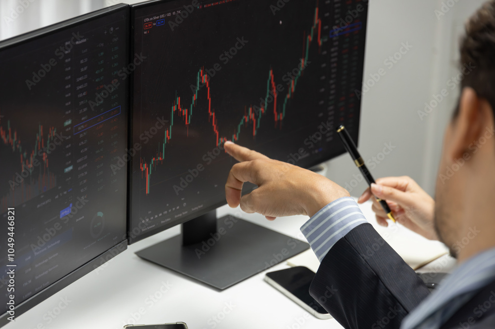 Focusing on hand pointing on pc screens with discussing dynamic stock ...