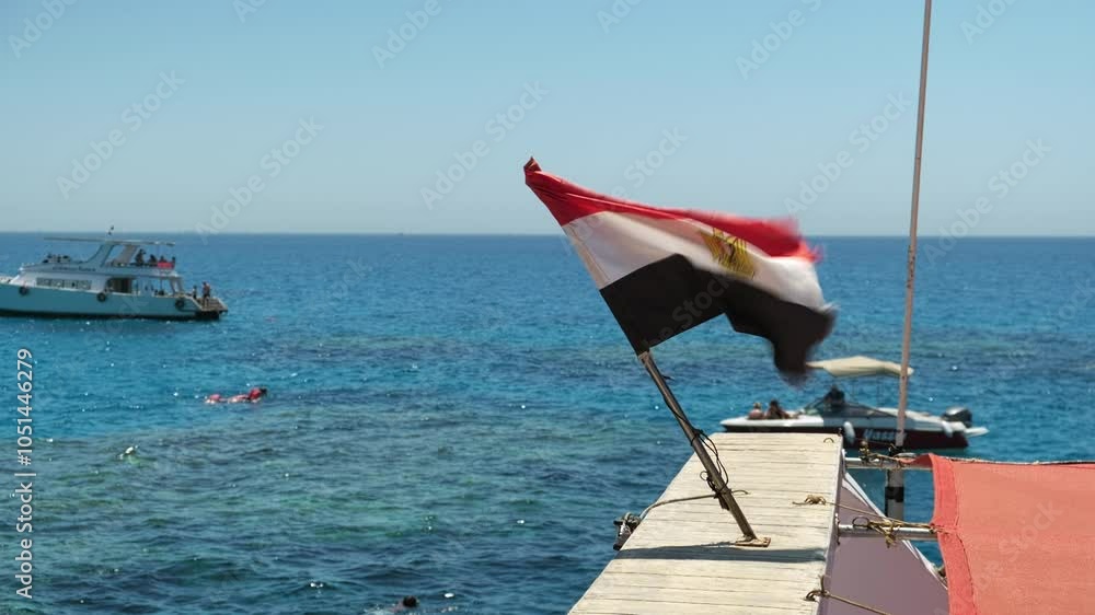 Real-time footage of flag waving on a boat in Red sea, Hurghada, Egypt ...