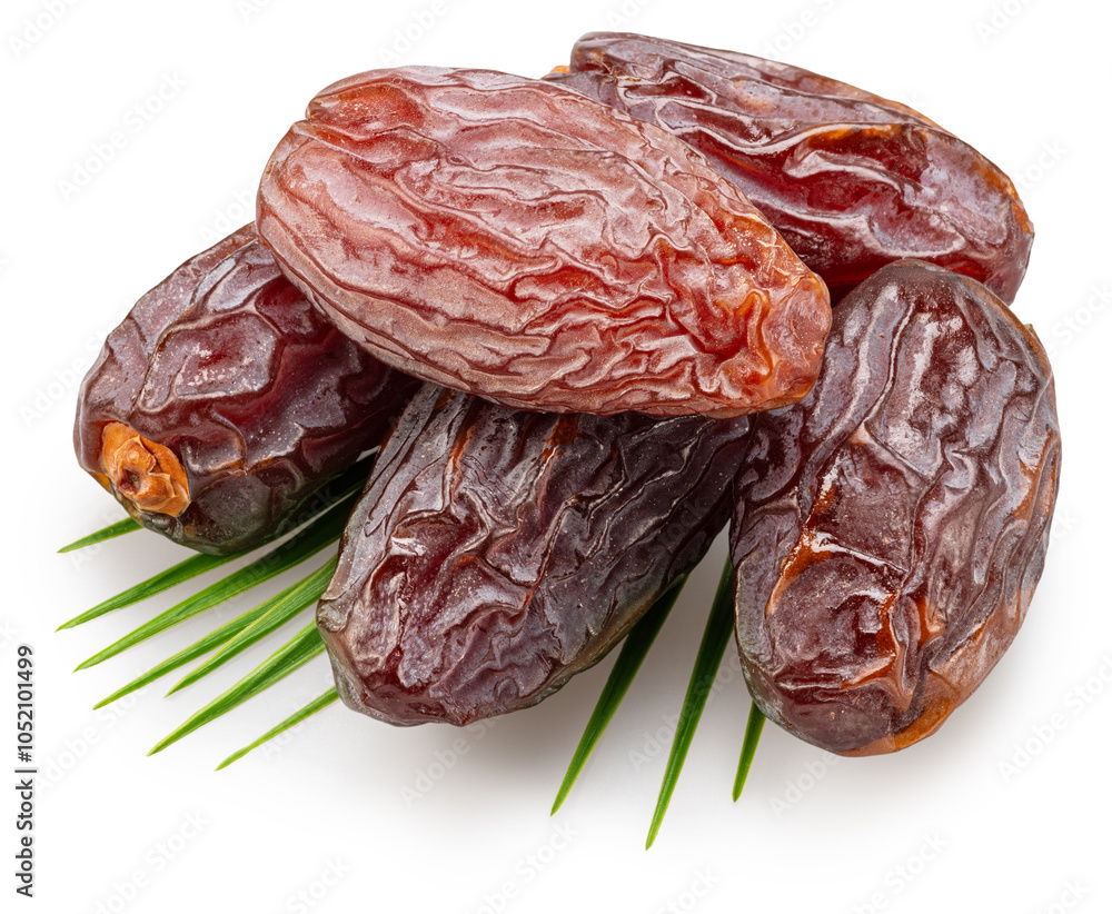 Semi-dried dates or date palm fruits lie on palm leaves isolated on ...